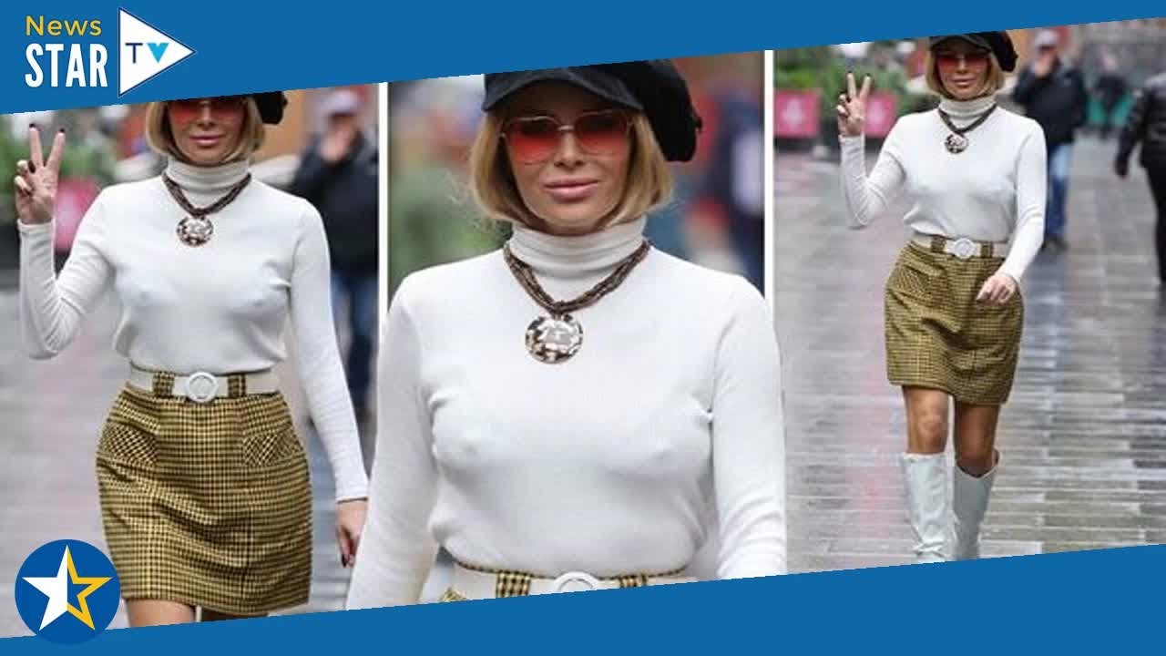 Amanda Holden goes braless in hippy outfit as she braves cold