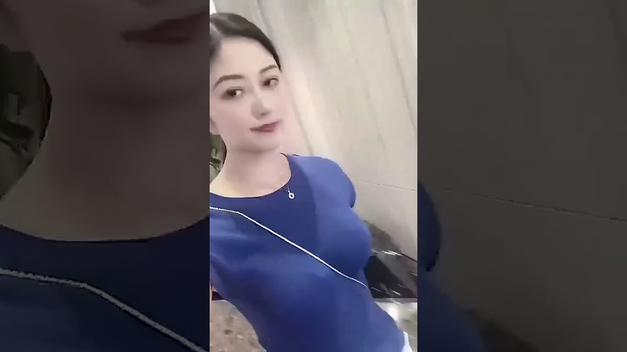 Big eyes and big breasts selfie in the street