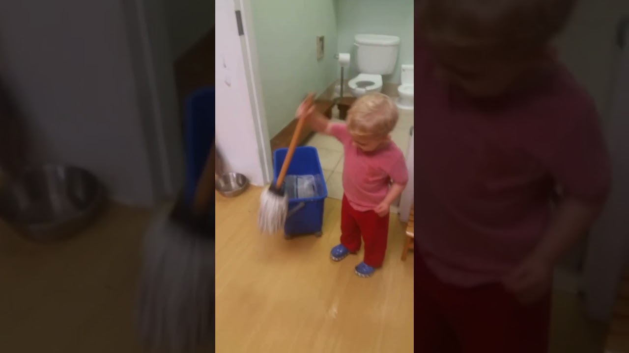 MONTESSORI toddler mopping the floor!