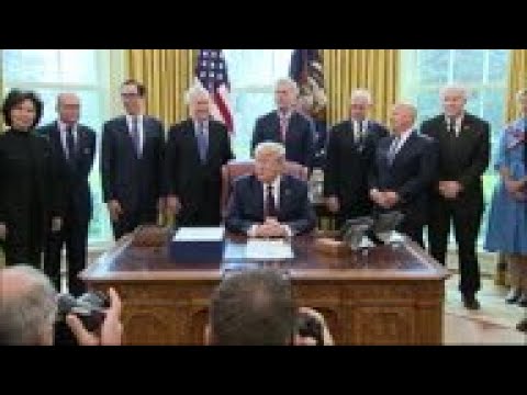 Trump signs $2.2 trillion stimulus package