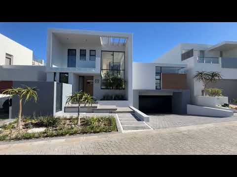 Brand new exceptional 4 Bedroom home in secure coastal estate