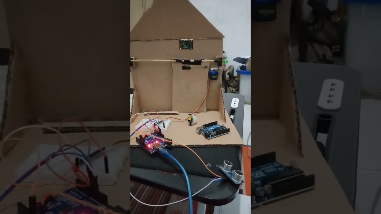 Pembuka pintu otomatis (sliding door) dengan sensor ultrasonik