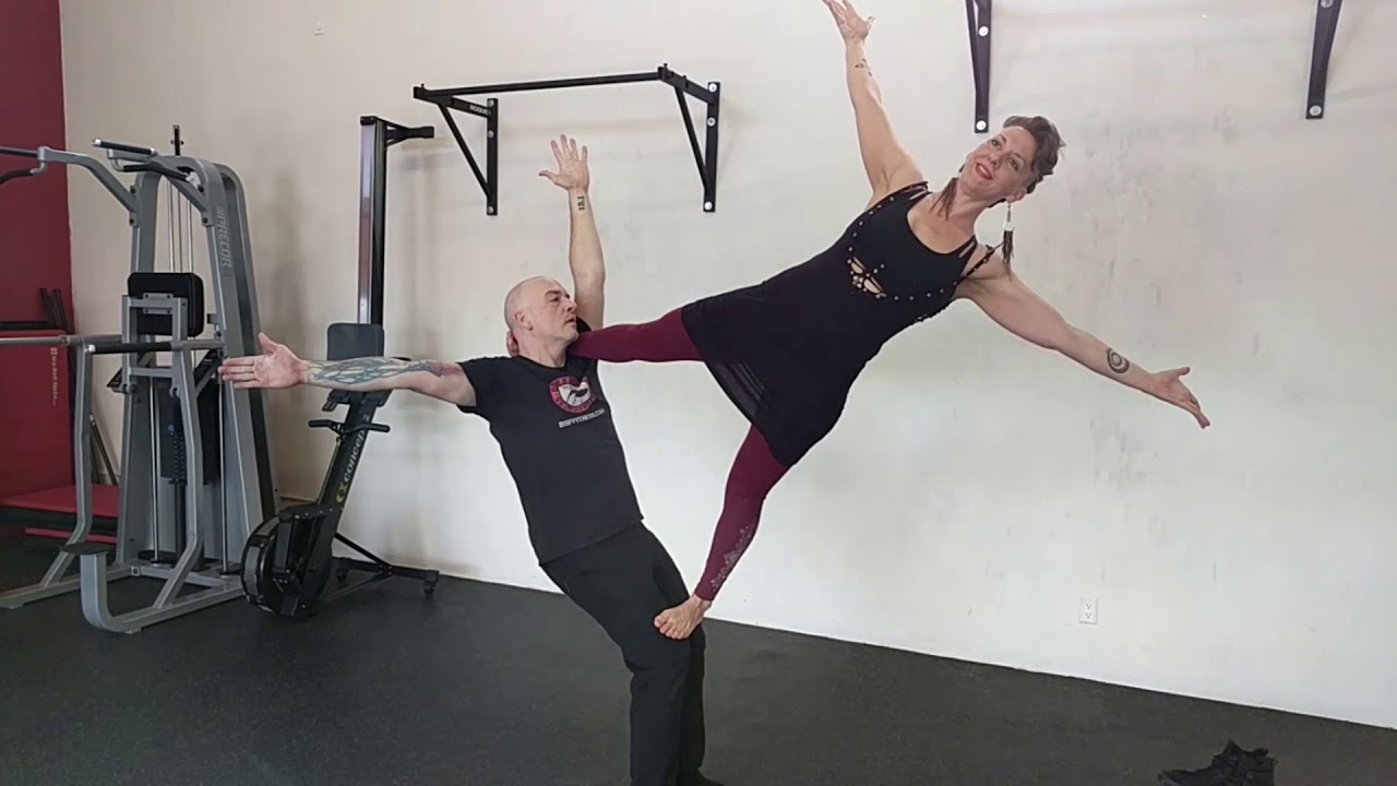 Standing AcroYoga Flag Pose