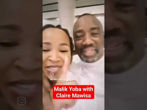 US actor Malik Yoba hanging with Claire Mawisa