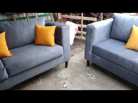sofa L Shape 6 seater and 2 seater grey in colour and yellow throw pillows