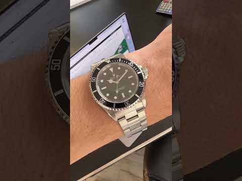Rolex Submariner No Date Steel 40mm Black Dial Ref. 14060M - The Luxury Hut