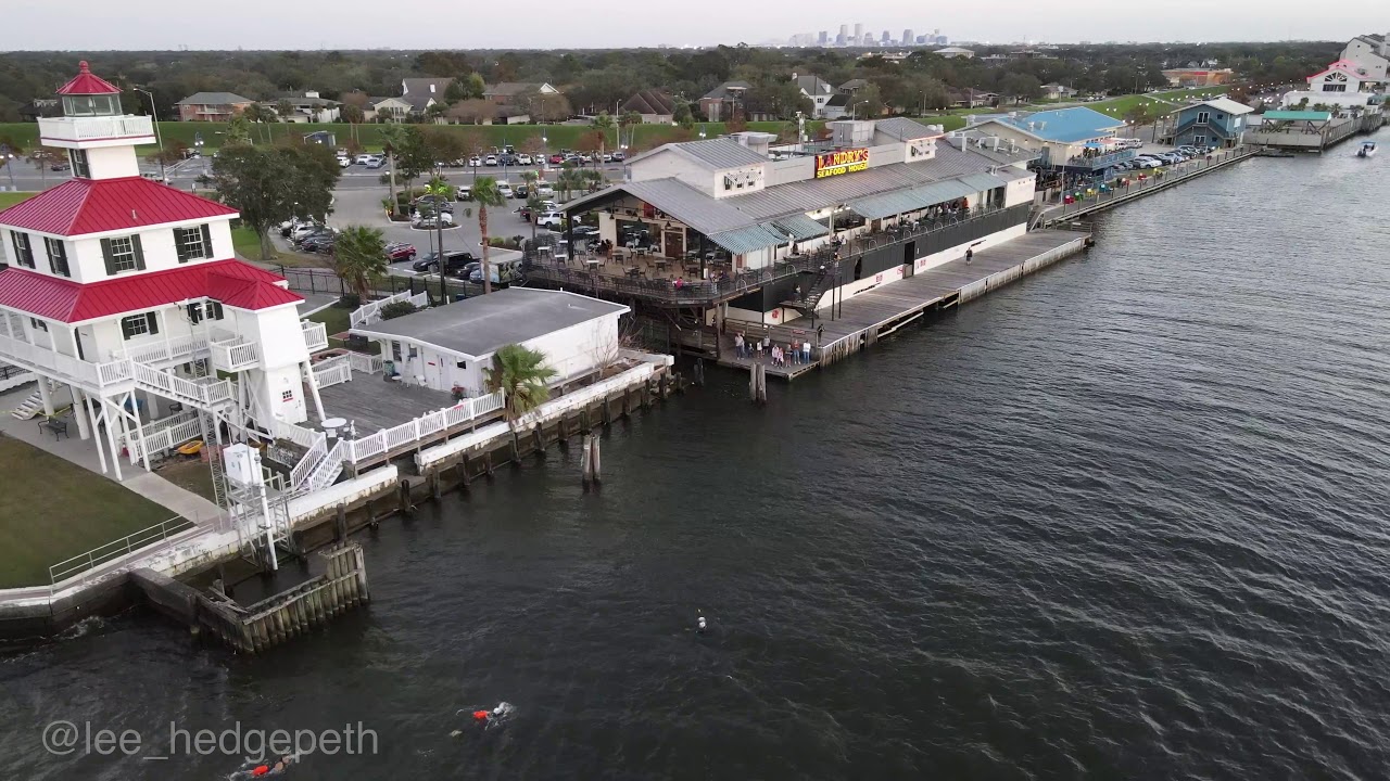 Drone video: Team of athletes swim across Lake Pontchartrain