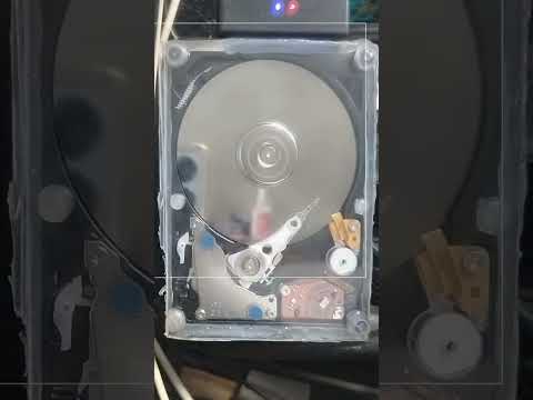 Transparent lid HDD in regenerating using HDD Regenerator.
