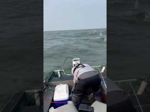 16 ft boat in Giant waves on Lake Michigan