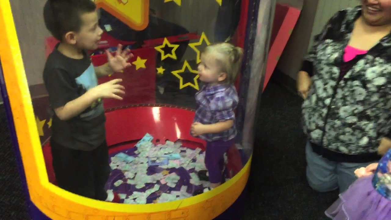 Sarah and baby Ellie in the ticket blaster at chuck e cheeses! Funny!