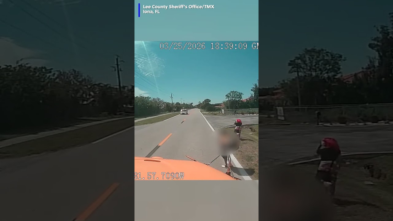 Student narrowly misses being hit by car passing school bus