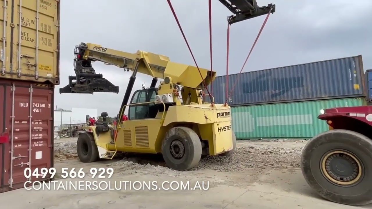 Using Reach Stackers at a Container yard. Container Solutions 
