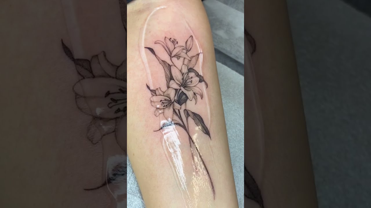 Lily flower hand Tattoo design.