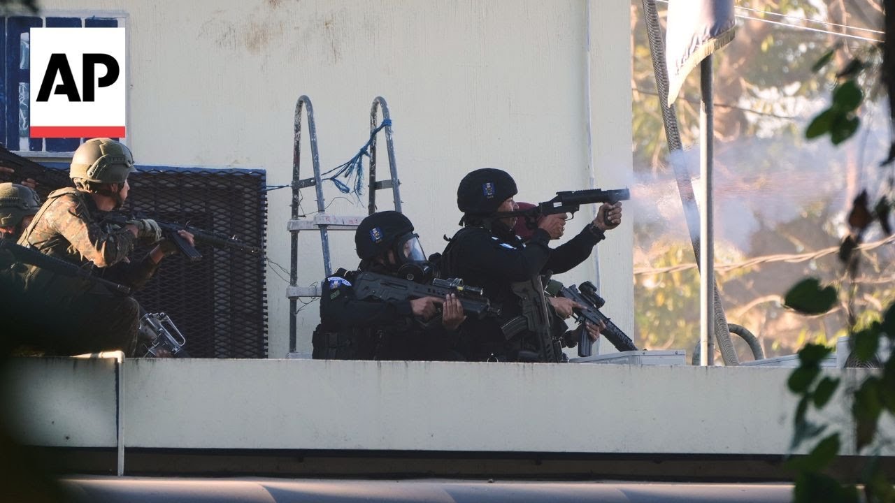 Police officers killed in Guatemala gang violence after inmates take over prisons