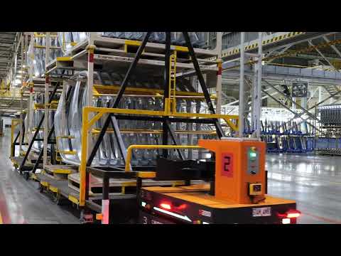 Case Study: Automating Car Part Movement for Stamping Operations with MAG1000 Tugger AMR and SyncOS™