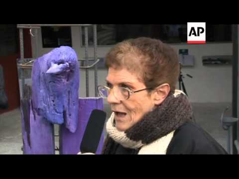 Contemporary arts museum burns artwork in protest against austerity