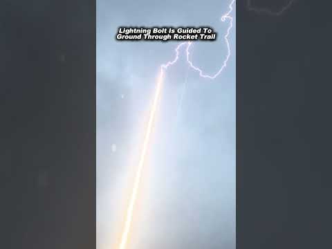 Lightning Bolt Is Guided To Ground Through Rocket Trail