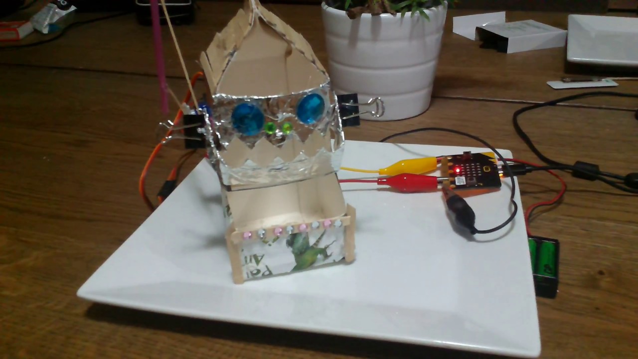 Milk carton robot programmed using BBC Micro-bit