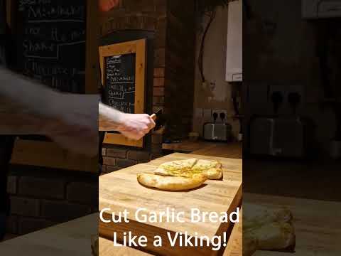 How Vikings Cut Garlic Bread! #axe #vikings #food