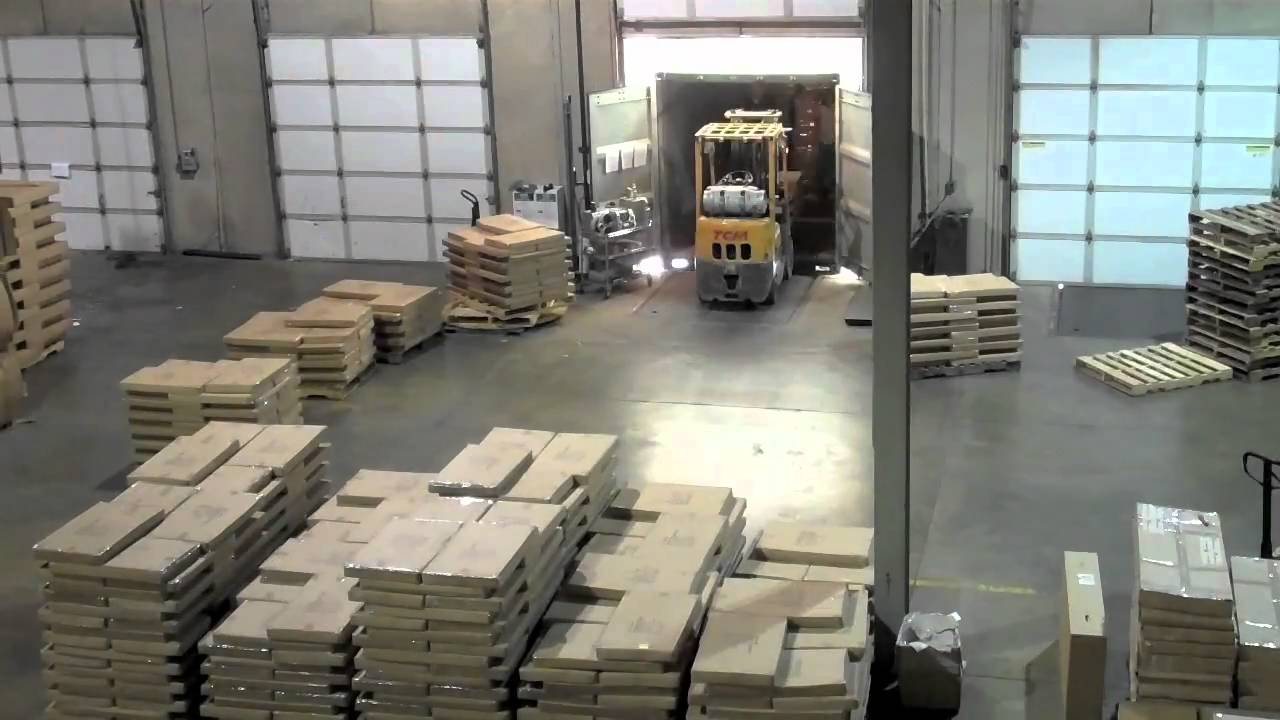 Time Lapse VIDEO: Unloading Container Full of BreezeArt & MatMates at Magnet Works