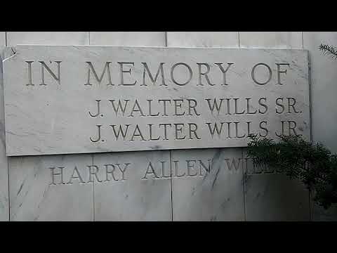 The Sign of the Former owners Names of House of Wills Funeral home still Listed On Granite stone