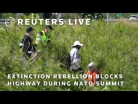 LIVE: Extinction Rebellion blocks highway during NATO summit