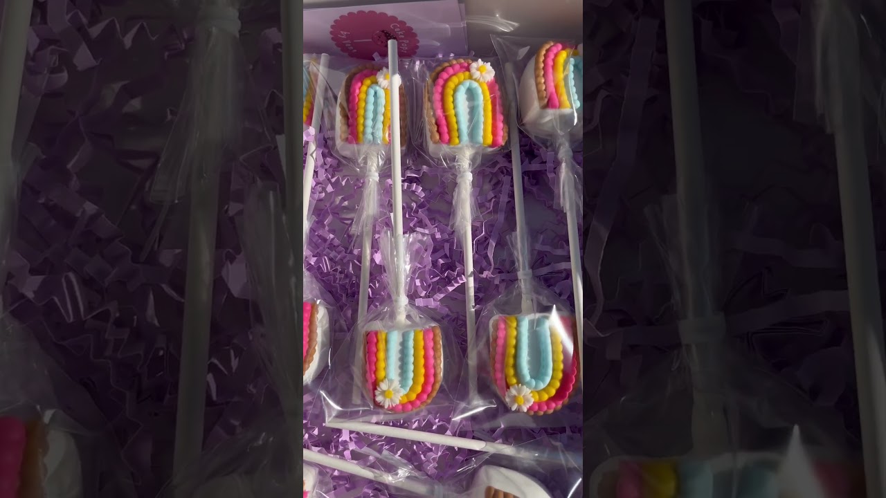 Groovy Rainbows 🌈🌻 #cakepops#cake #rainbow #sunflower