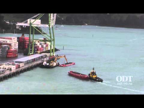 A digger dredging the Port Otago basin