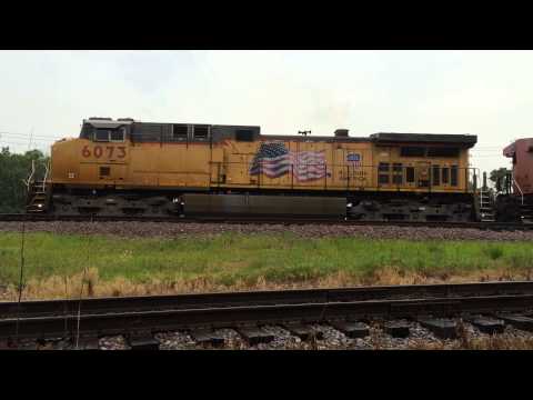 UP 6073 And SP 319 and SP 6358 With a Coal Train