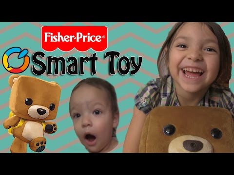 Ari unboxing the Fisher-Price Smart Interactive Bear Toy