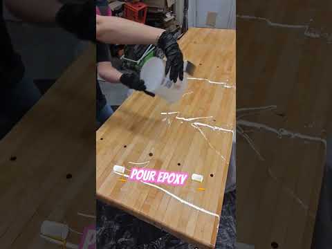 Epoxy coat over reclaimed bowling alley for L shaped desk. #woodworking #epoxy #reclaimed #bowling