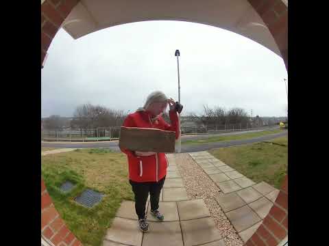 Royal mail at door with parcel but no one in