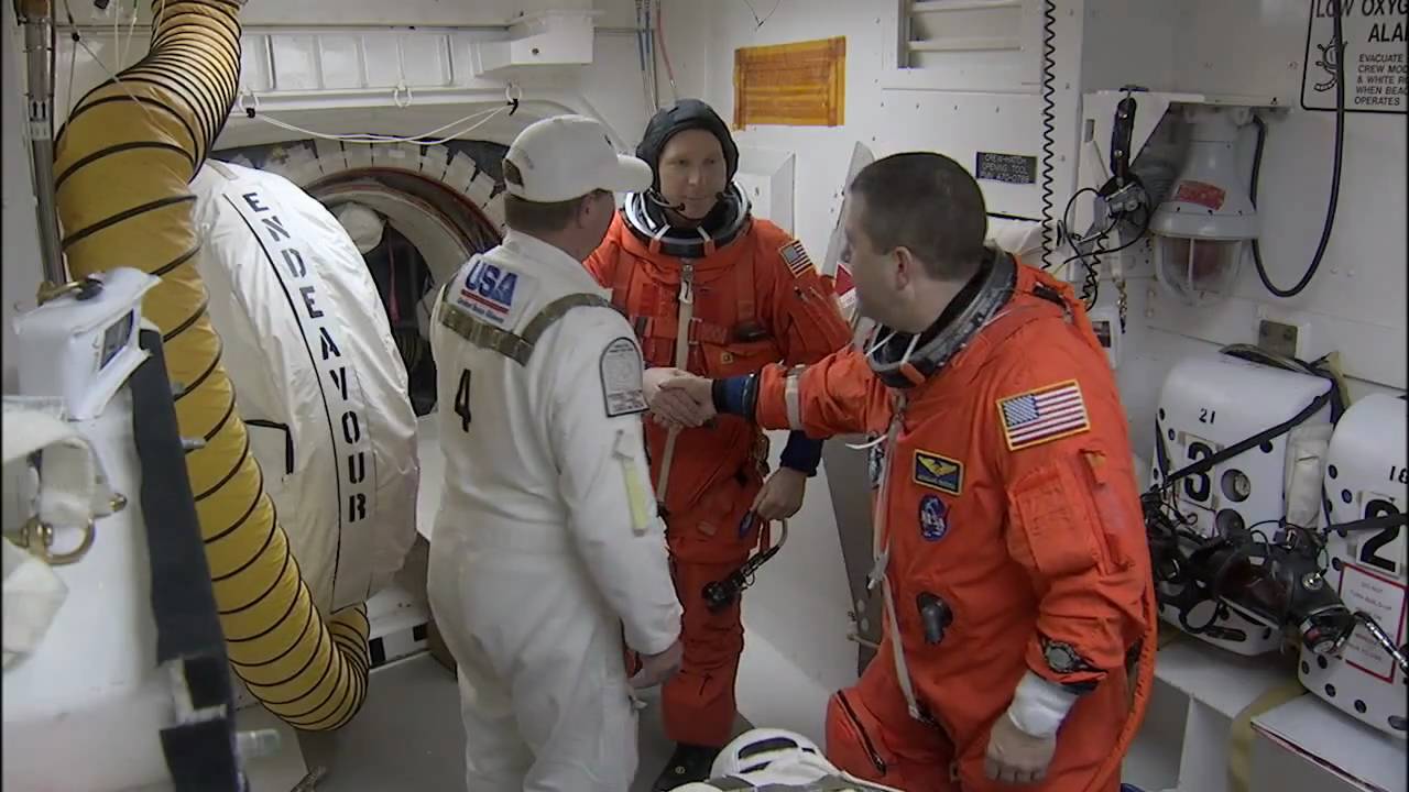 STS-130 Crew Strap In for Launch