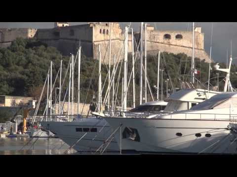Antibes, France Old Town with ancient church, narrow lanes, food market, pedestrian zone, marina.