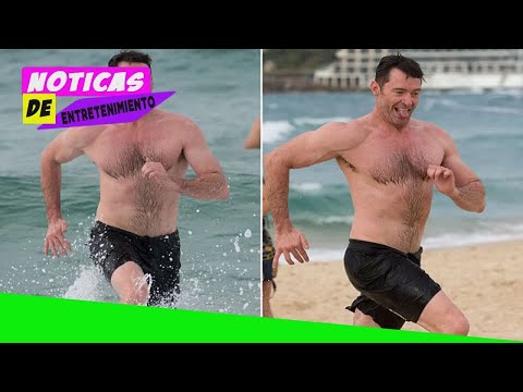 Hugh Jackman shows off his rippling muscles in Sydney