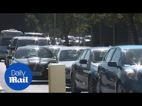 Cars queue for petrol across the UK amid fears of fuel shortage