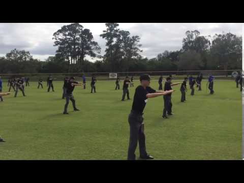 Umpire school signals "Safe, off the bag" at the Minor League Baseball Umpire Training Academy