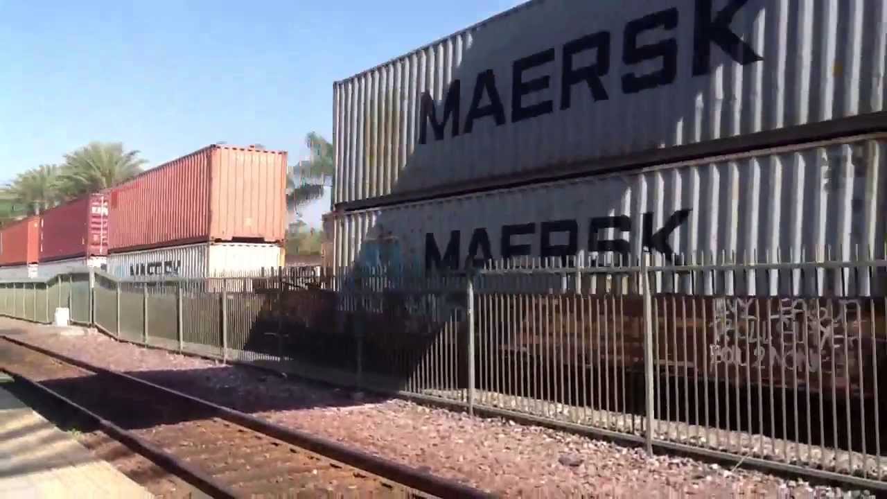 BNSF 7603 leads a Stack Train past Fullerton Station.
