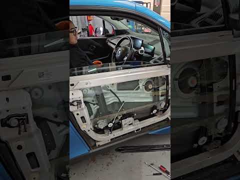 BMW i3 has just had its window regulator replaced. Here, we are testing the new one. #bmwworkshop