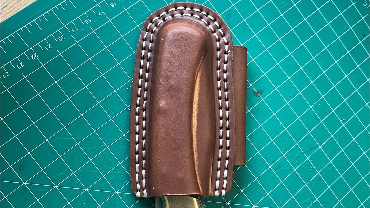 Buck 110 sheath, my first attempt