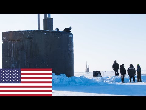 US Navy fast attack submarine surfacing the Arctic Circle.