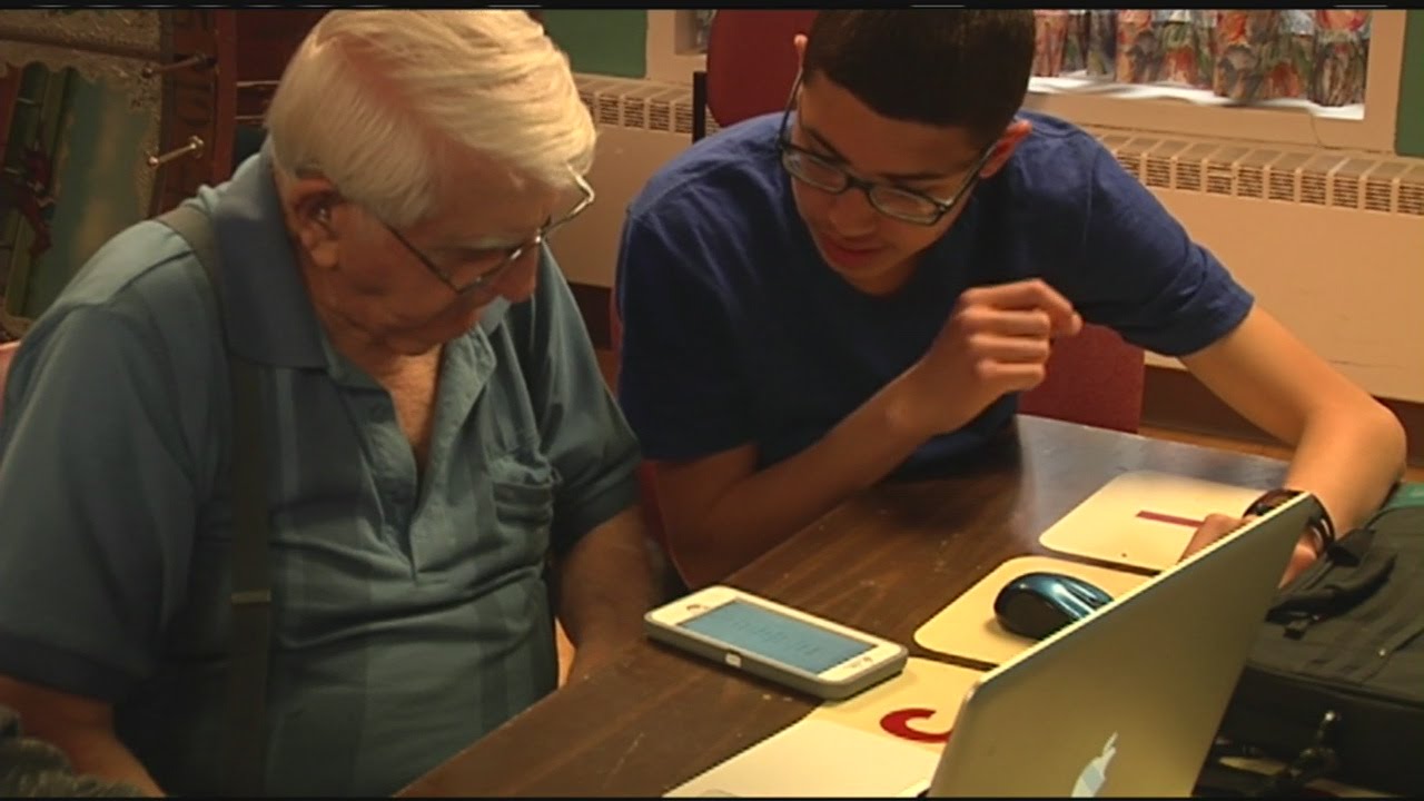Teens teach computer skills to senior citizens