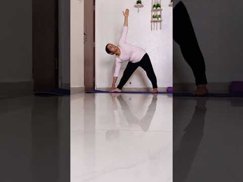 Trikonasana (triangle pose)#trikonasana #explore #ytshorts #yoga #yogapractice #pose #posetutorial