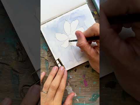 Painting white watercolor flowers using the technique of negative space painting