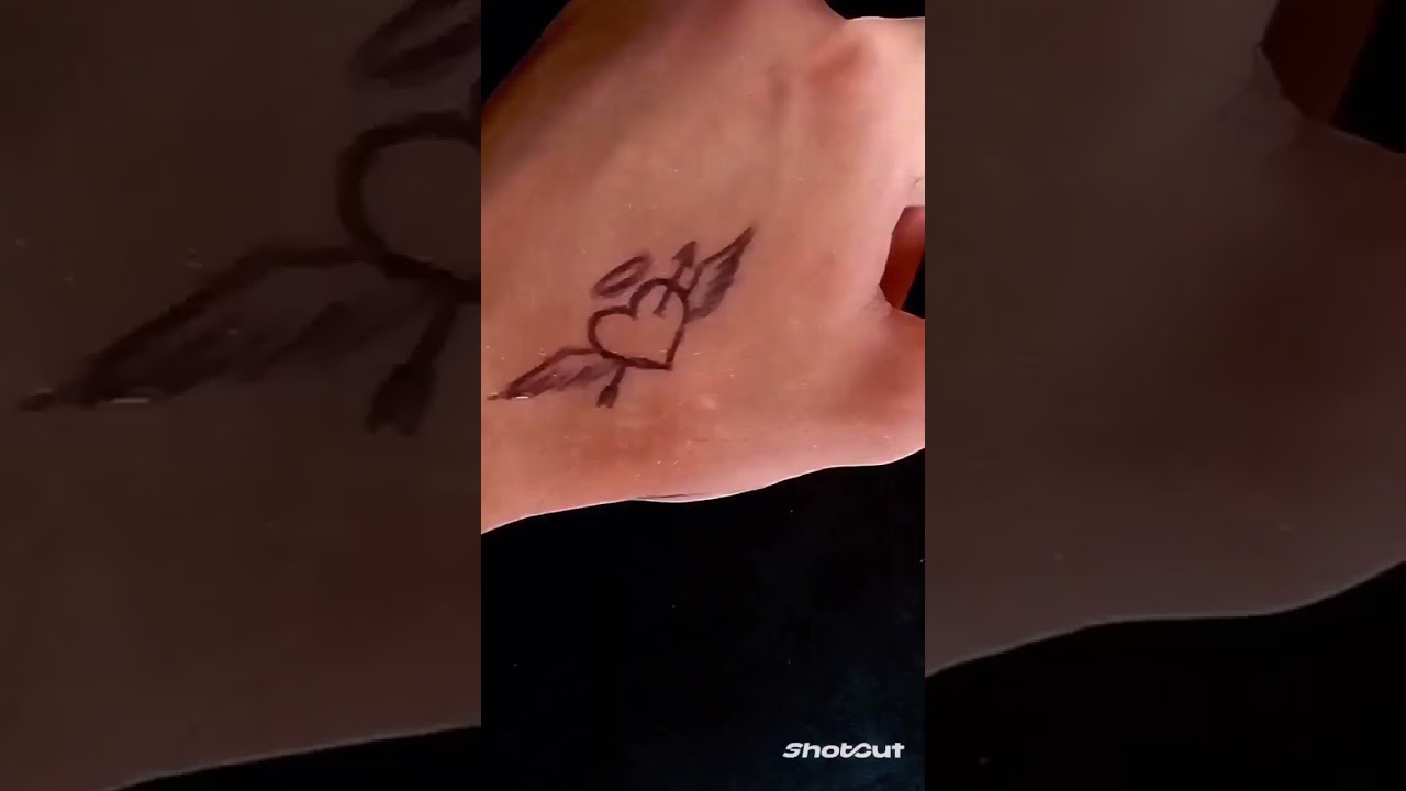 Coração cupido - desenho na pele
