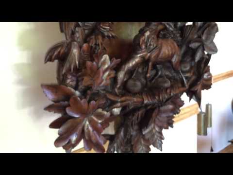 Magnificent 5 Foot Romantic Heavily Carved Musical Antique Cuckoo Clock blackforestclocks.org