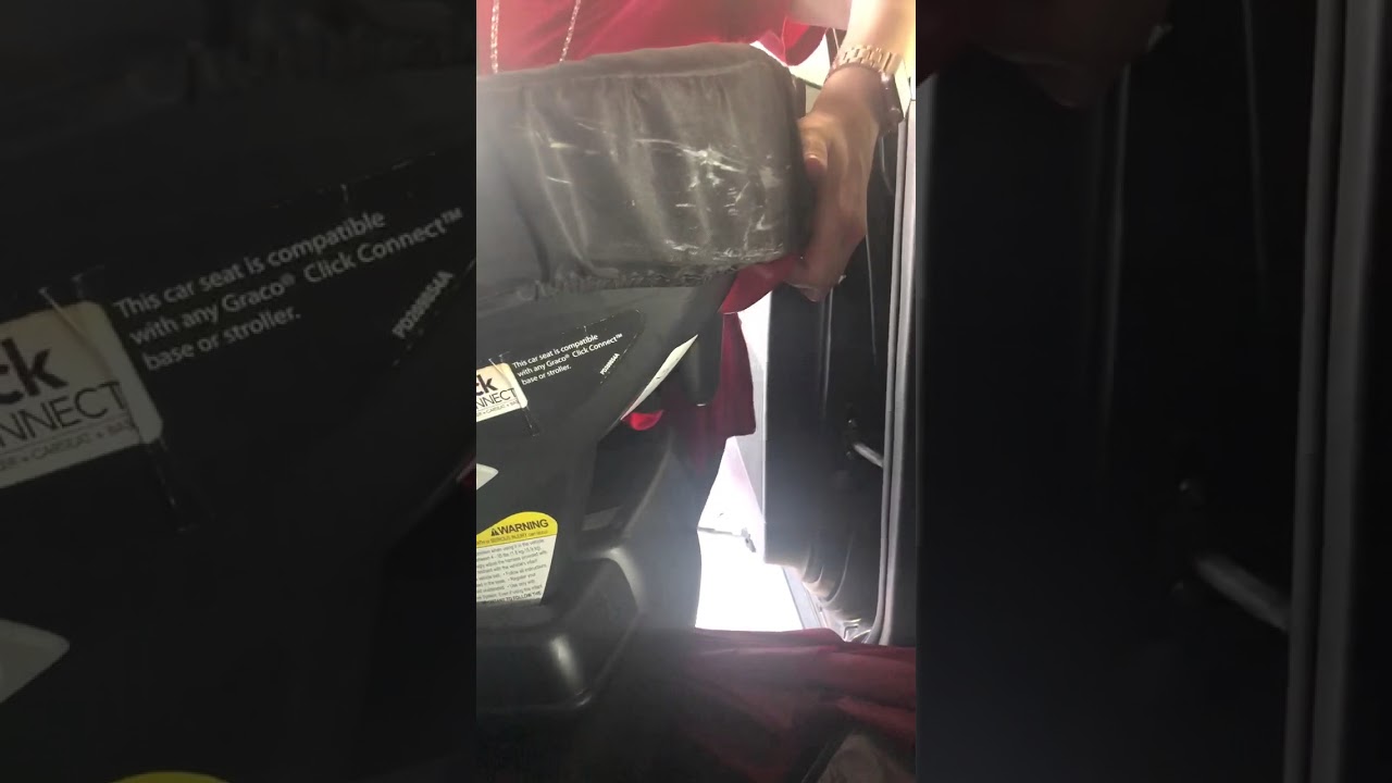 Taking car seat out of base