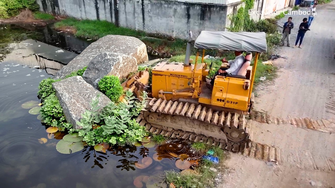 BEST Full video Earthmoving truck fill in areas where there is no flat ground and push it with dozer