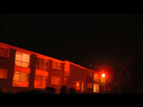 Chinese Sky Lanterns moving through the night sky in Gateshead, England