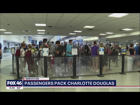 Passengers pack Charlotte-Douglas International Airport
